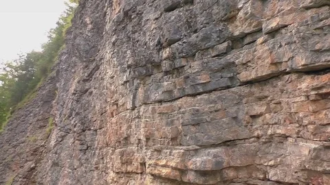 Horizontally layered rocks closeup on a ... | Stock Video | Pond5
