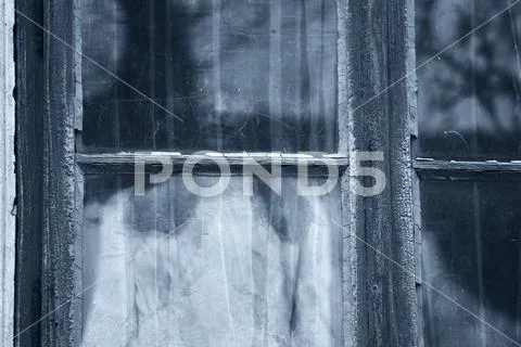 Horror image of female ghost at the old grunge window Stock Photo #92909115