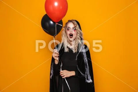 Horror wizard woman 20s wearing black costume and halloween makeup ...