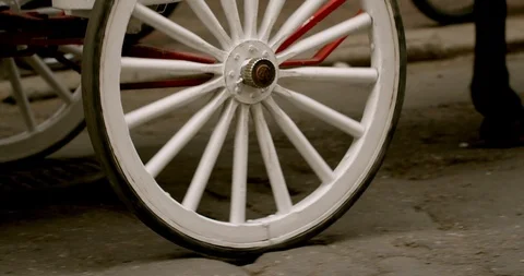 Horse-Drawn Carriage Wheel in French Qua... | Stock Video | Pond5