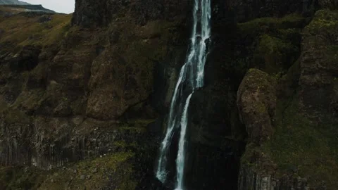 Horsetail narrow waterfalls dripping at ... | Stock Video | Pond5