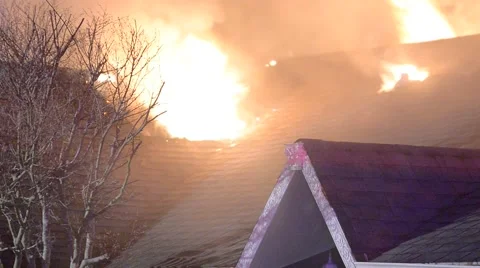 Hose fire flames burn through the roof.F... | Stock Video | Pond5