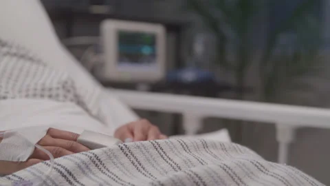 Hospital Patient Resting In Bed | Stock Video | Pond5
