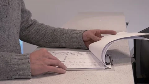 Hospital staff checking paperwork on rec... | Stock Video | Pond5