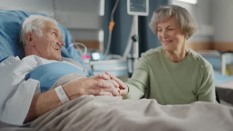 Hospital Ward Old Husband in Bed Wife Vi... | Stock Video | Pond5