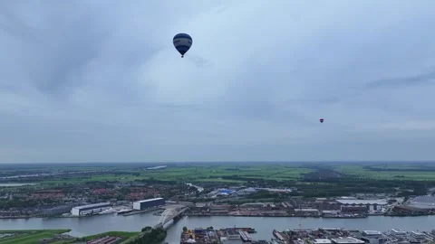 Hot air balloons operating high in the s... | Stock Video | Pond5