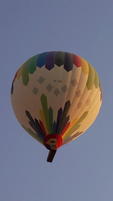 Hot air baloon flying in sky | Stock Video | Pond5