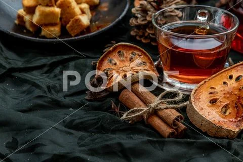 Hot bael fruit tea with bark of bael fruit and Crispy butter toast ...