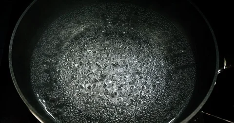 Hot Boiling Water in a saucepan, Slow mo... | Stock Video | Pond5