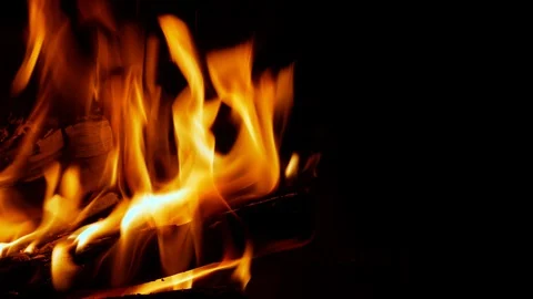 Hot fire and flames from wood logs burni... | Stock Video | Pond5