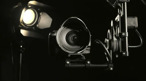 Hot head camera on jib crane moving in d... | Stock Video | Pond5