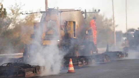 Hot recycling machines running on the ro... | Stock Video | Pond5