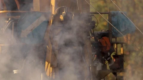 Hot recycling machines running on the ro... | Stock Video | Pond5