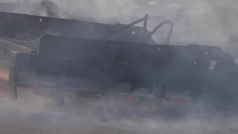 Hot recycling machines running on the ro... | Stock Video | Pond5