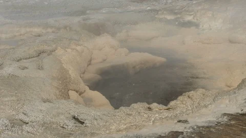 Hot spring splashing water in Yellowston... | Stock Video | Pond5