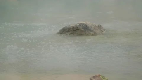 hot sulfurous water filled with bubbles ... | Stock Video | Pond5