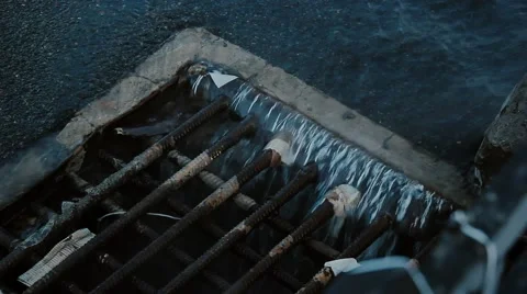 Hot water flows into storm sewers | Stock Video | Pond5