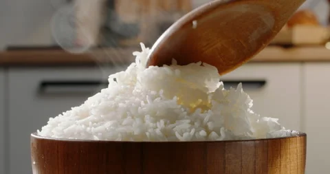 Hot white cooked rice steam bowl kitchen... | Stock Video | Pond5