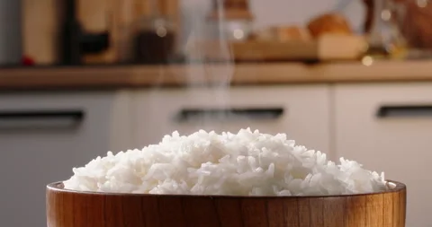 Hot white cooked rice steam bowl kitchen... | Stock Video | Pond5
