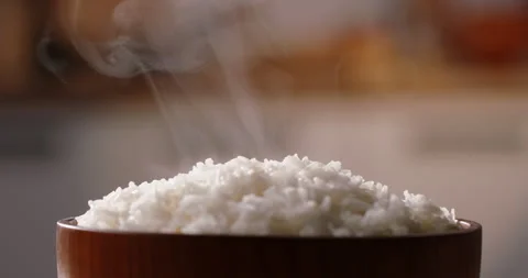 Hot white cooked rice steam bowl blurred... | Stock Video | Pond5