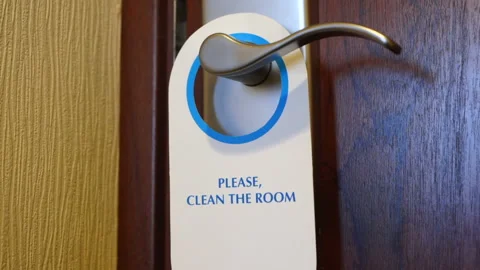 Hotel room cleaning request door sign. P... | Stock Video | Pond5