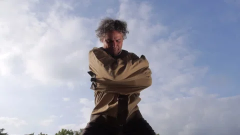 Straight Jacket Stock Footage ~ Royalty Free Stock Videos | Pond5