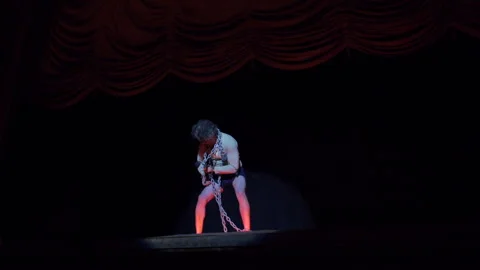 Houdini magic trick, escape artist in ch... | Stock Video | Pond5