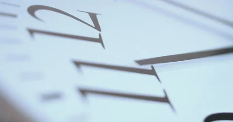 The hour hand of the clock starts at the... | Stock Video | Pond5