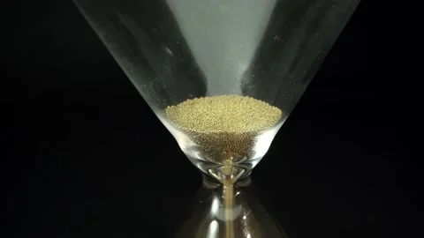 Hourglass. Time is running out. Sand fal... | Stock Video | Pond5
