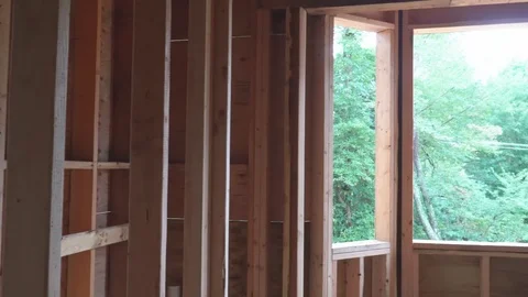 House timber frame for a progressing hou... | Stock Video | Pond5
