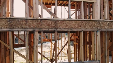 House timber frame for a progressing hou... | Stock Video | Pond5