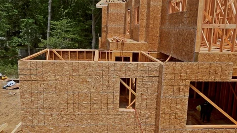 House timber frame for a progressing hou... | Stock Video | Pond5