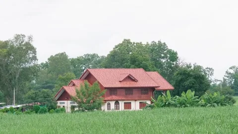 House zoomed out in the middle of farmla... | Stock Video | Pond5