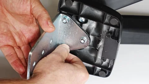 How to install a bracket for your equipm... | Stock Video | Pond5