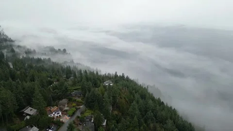 Howe Sound covered in Clouds and Fog dur... | Stock Video | Pond5