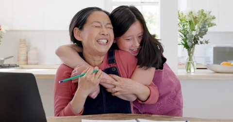 Hug, child and mother working with a lap... | Stock Video | Pond5