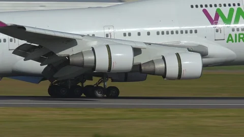 huge airplane boeing 747 wheels touchdow... | Stock Video | Pond5