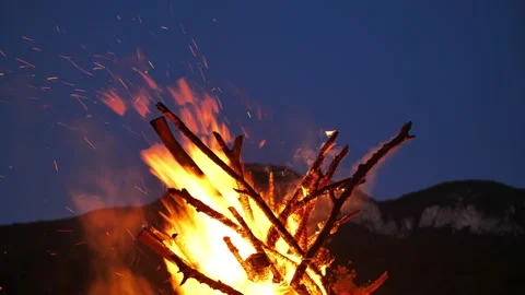 A huge bonfire with sparks on the backgr... | Stock Video | Pond5