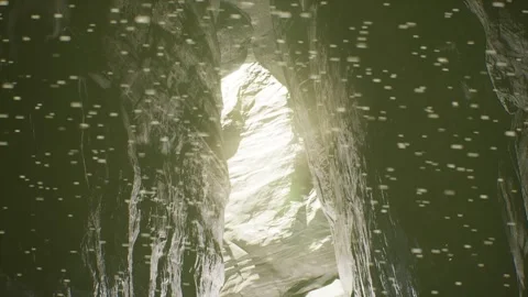 A huge cave with dust particles floating... | Stock Video | Pond5