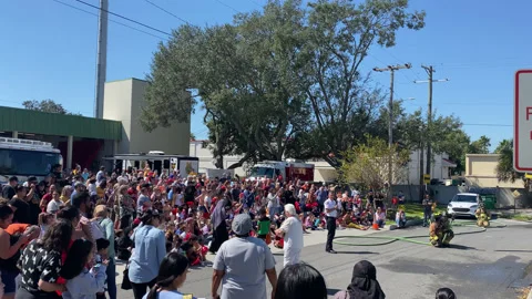 Huge Crowd at the end of a fire and safe... | Stock Video | Pond5