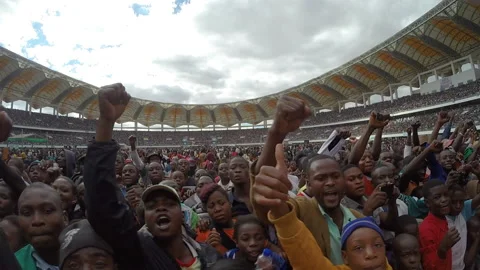 Huge gathering of people cheering at Nat... | Stock Video | Pond5