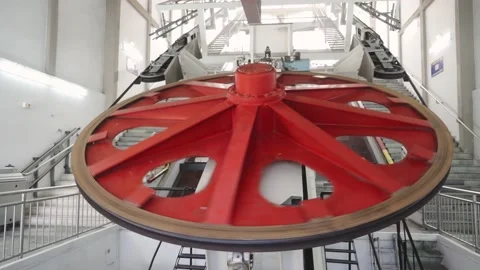 A huge lifting disc is spinning lifting ... | Stock Video | Pond5