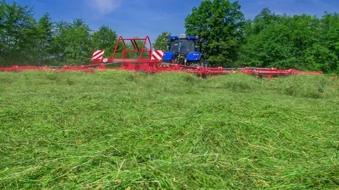Hay Turning Machine Stock Footage ~ Royalty Free Stock Videos | Pond5