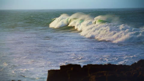 Huge ocean wave rolling in slow motion. ... | Stock Video | Pond5