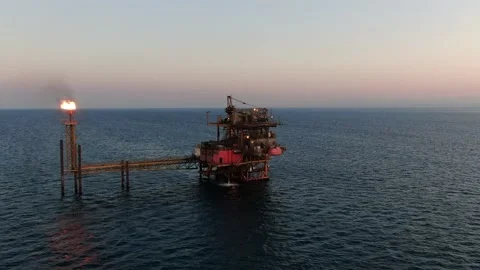 Huge oil rig with fire coming out of the... | Stock Video | Pond5