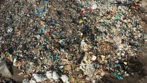 Huge piles of plastic waste lie on urban... | Stock Video | Pond5