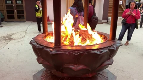 A huge pot of fire burning in Seoul temp... | Stock Video | Pond5