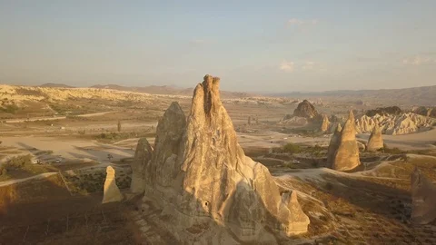 Huge rocks and dusty rocky terrain in th... | Stock Video | Pond5