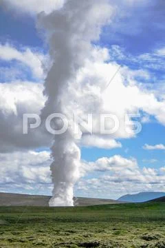 Huge steam column coming out of earth ~ Premium Photo #22563129