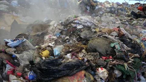 A huge stinking pile of garbage rotting ... | Stock Video | Pond5